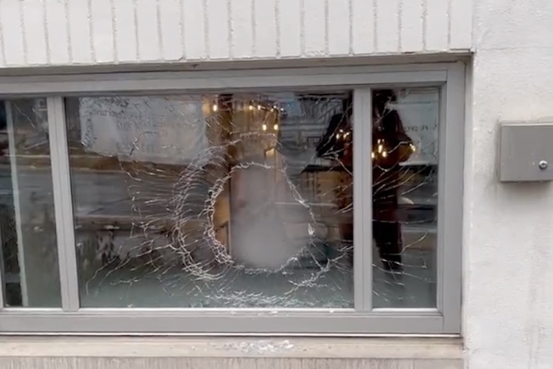 Broken window - Metro Weekly